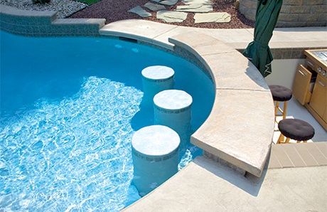What is a Swim-Up Pool Bar?—and How to Add One to Your Backyard