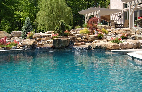 Natural Rock Waterfalls in Swimming Pools: 12 Inspiring Examples in ...