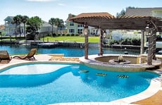 What is a Swim-Up Pool Bar?—and How to Add One to Your Backyard