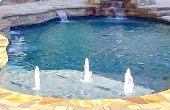 10 Swimming Pool Water Feature Ideas (Besides Rock Waterfalls)