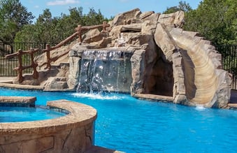 Rock Waterfall Pool Slides: Design Guide + Photos