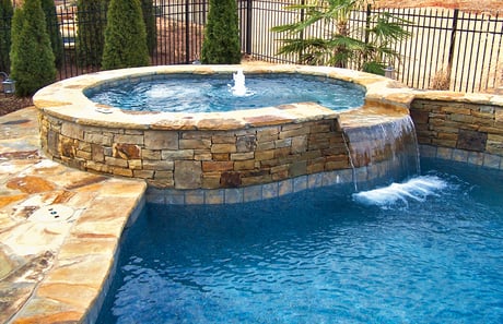 What is a rim flow spa on a custom swimming pool? (with design photos)