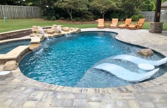 12 Clever Ways for Integrating Stone into Pools—In Photos