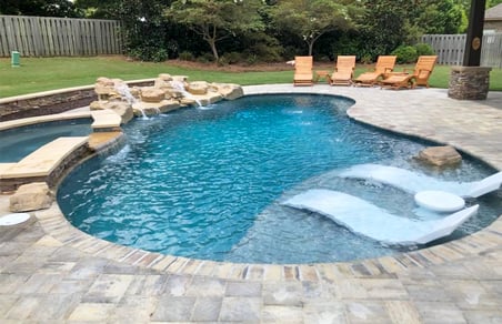 12 Clever Ways for Integrating Stone into Pools—In Photos