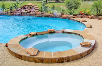 12 Clever Ways for Integrating Stone into Pools—In Photos