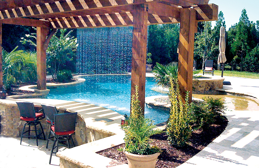 What is a rain curtain water feature on a swimming pool?