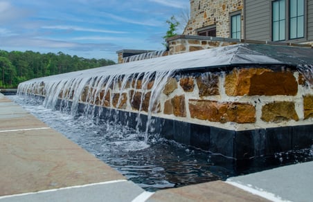 What is a reverse infinity-edge swimming pool?