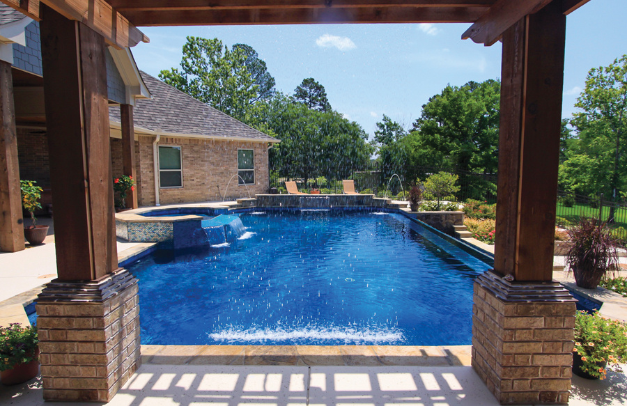 What is a rain curtain water feature on a swimming pool?