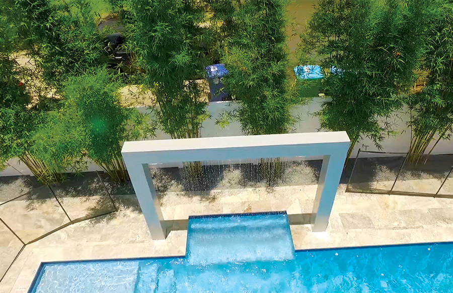 What is a rain curtain water feature on a swimming pool?