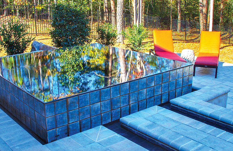 What is a rim flow spa on a custom swimming pool? (with design photos)