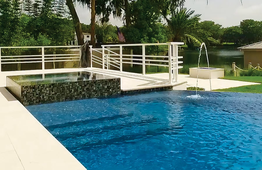 What is a rim flow spa on a custom swimming pool? (with design photos)