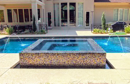 What is a rim flow spa on a custom swimming pool? (with design photos)